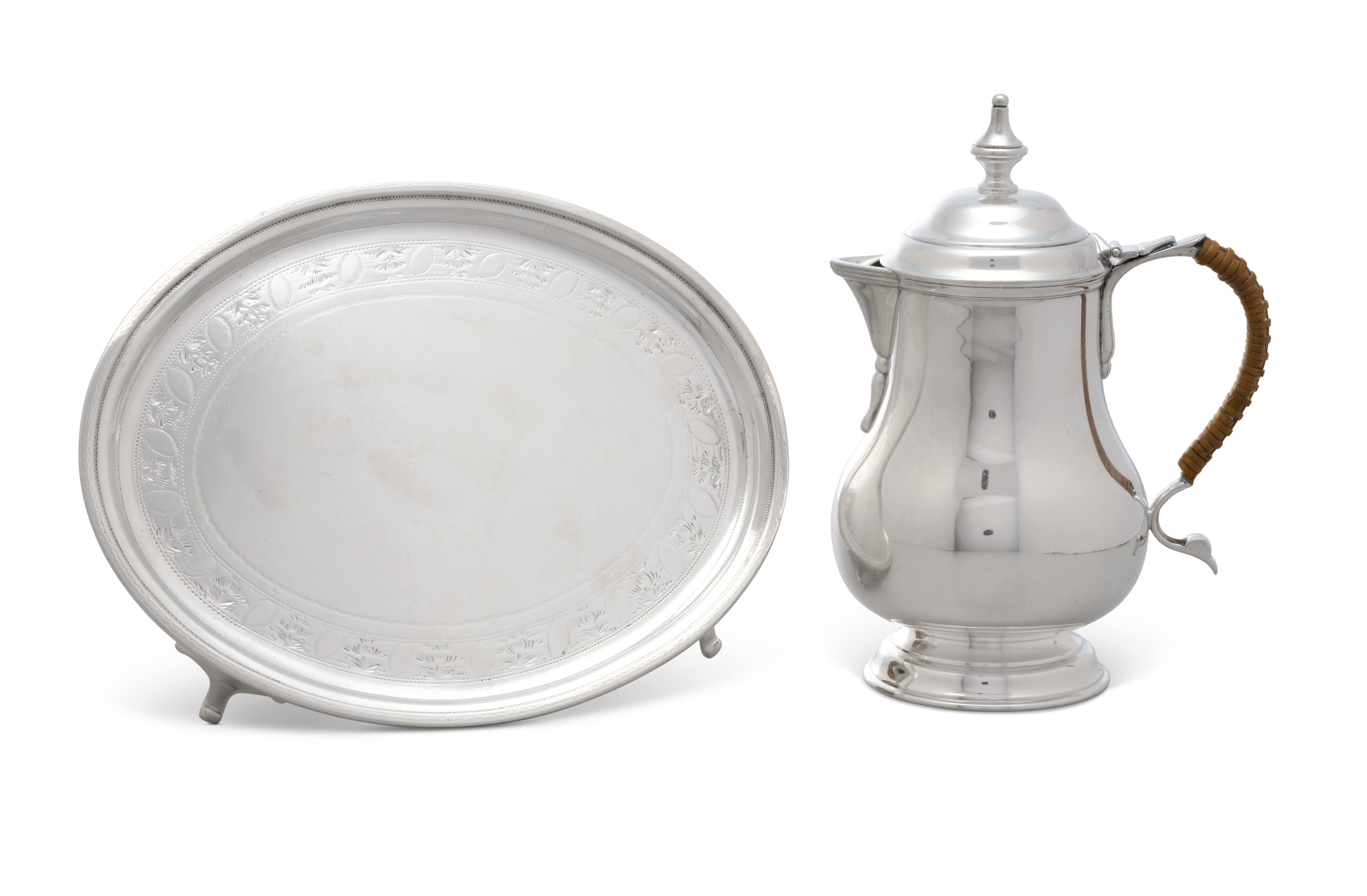 AN AMERICAN SILVER HOT MILK POT AND AN AMERICAN SILVER TEAPOT STAND ...