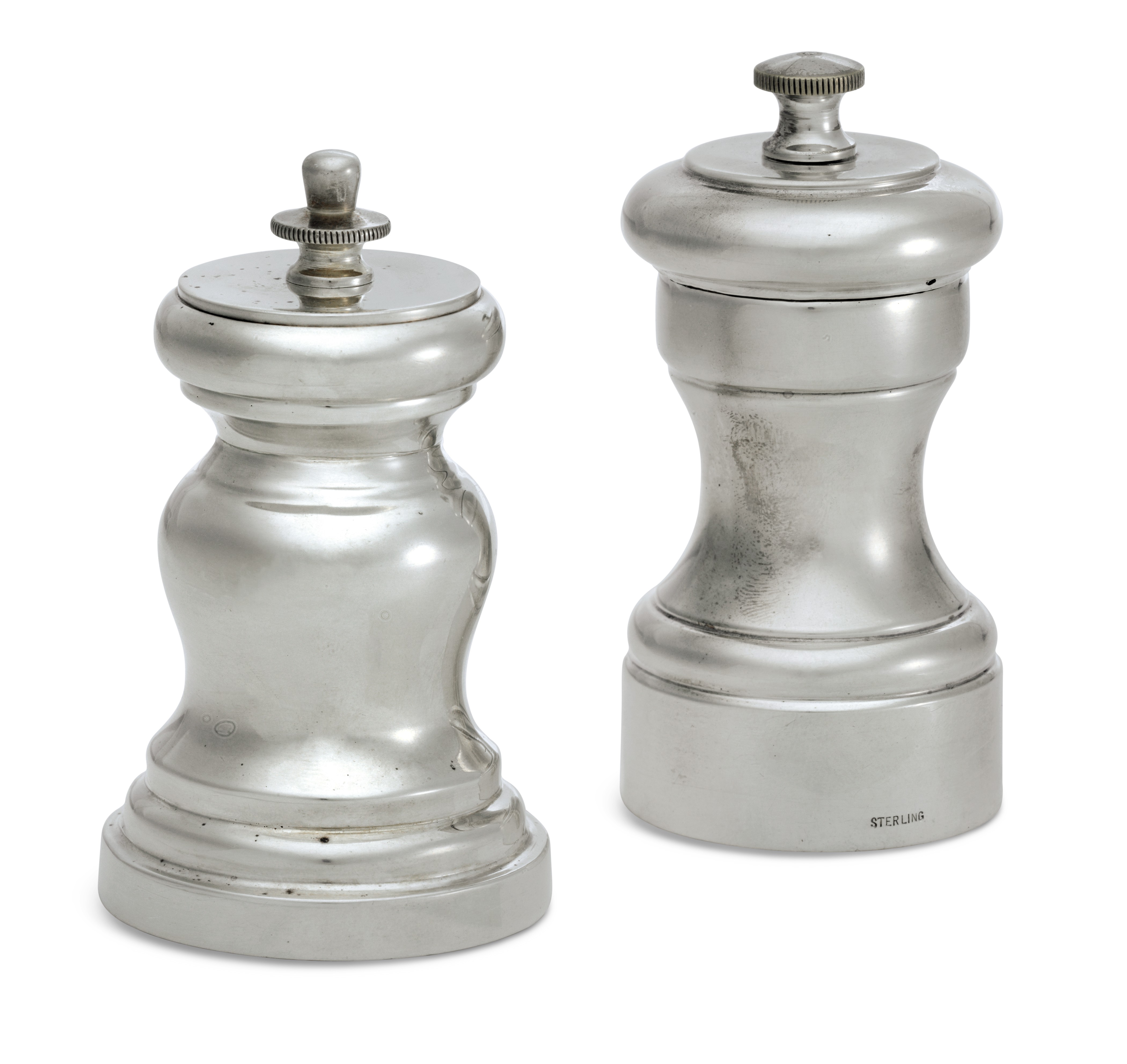 AN AMERICAN SILVER PEPPER GRINDER AND AN ENGLISH SILVER-PLATED PEPPER ...