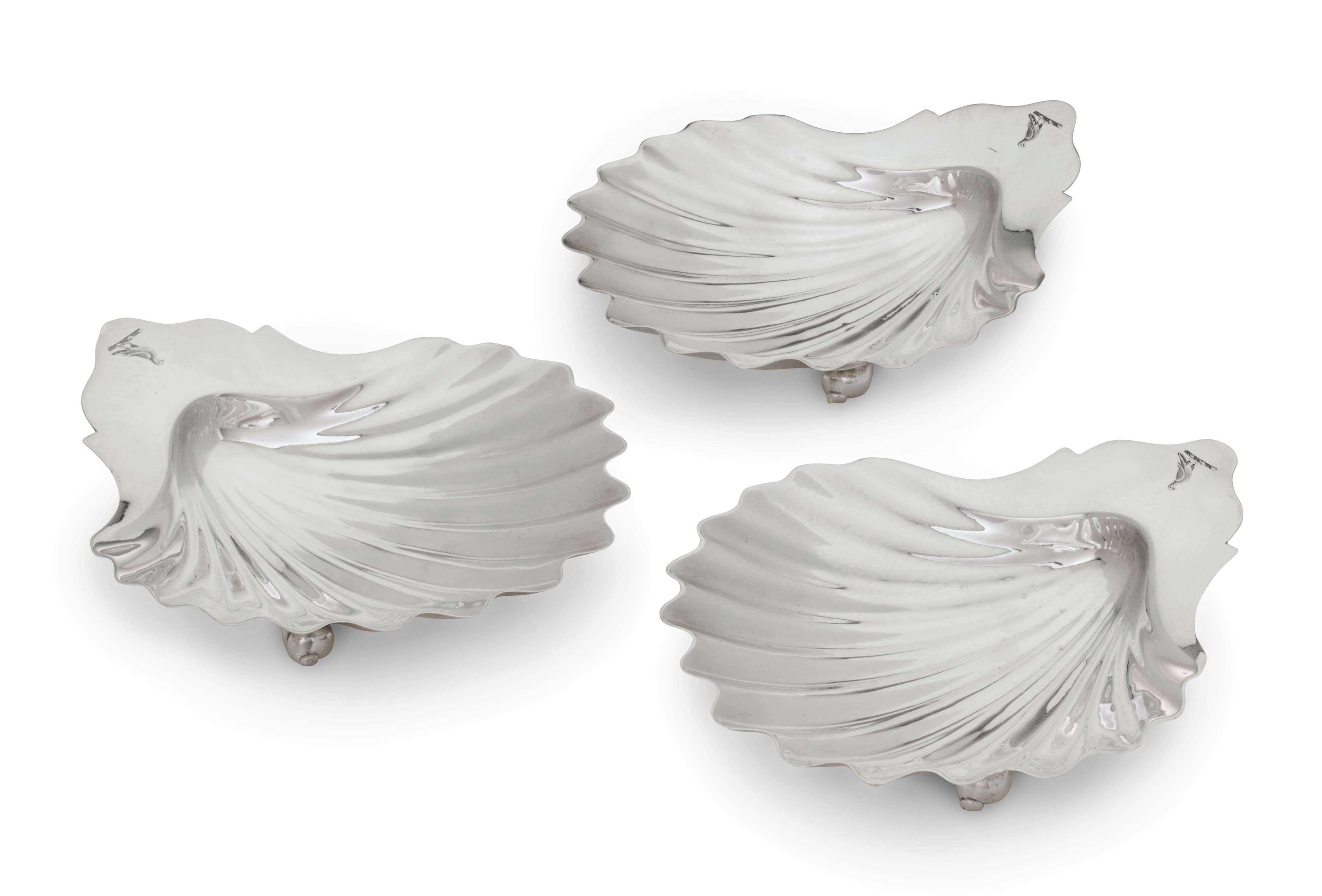 A SET OF THREE GEORGE III SILVER BUTTER SHELLS, MARK OF CHARLES ...