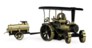A WILESCO BRASS AND BLACK-PAINTED TIN PLATE STEAM TRACTOR AND WATER ...