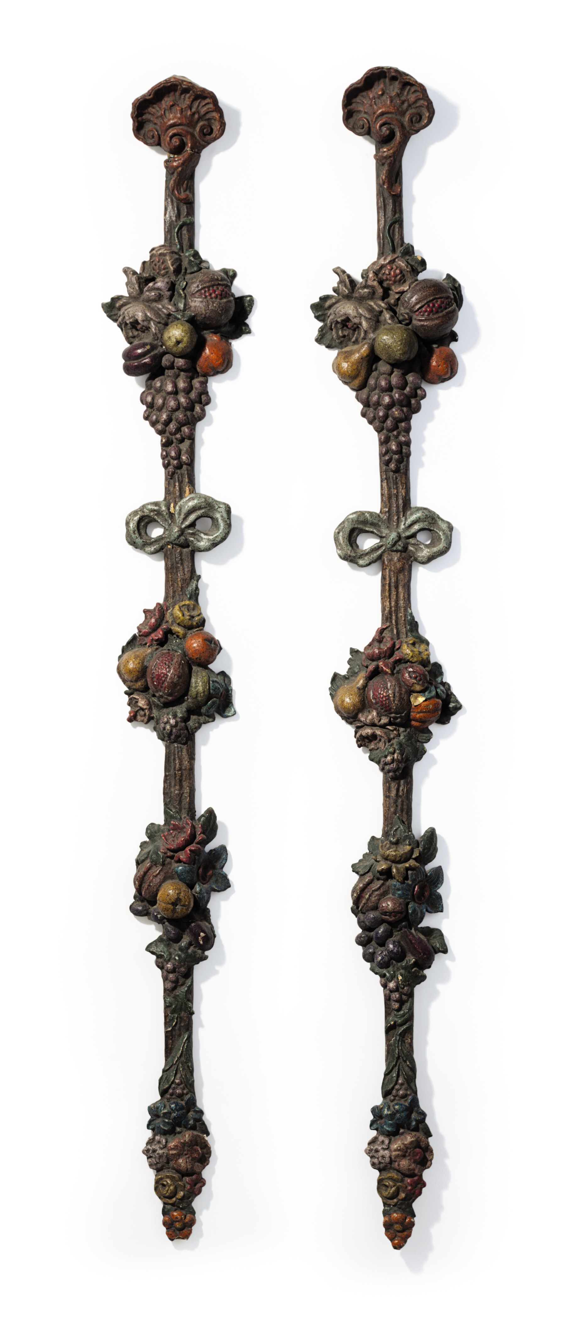 A PAIR OF VICTORIAN POLYCHROME-PAINTED COMPOSITION WALL HANGINGS ...