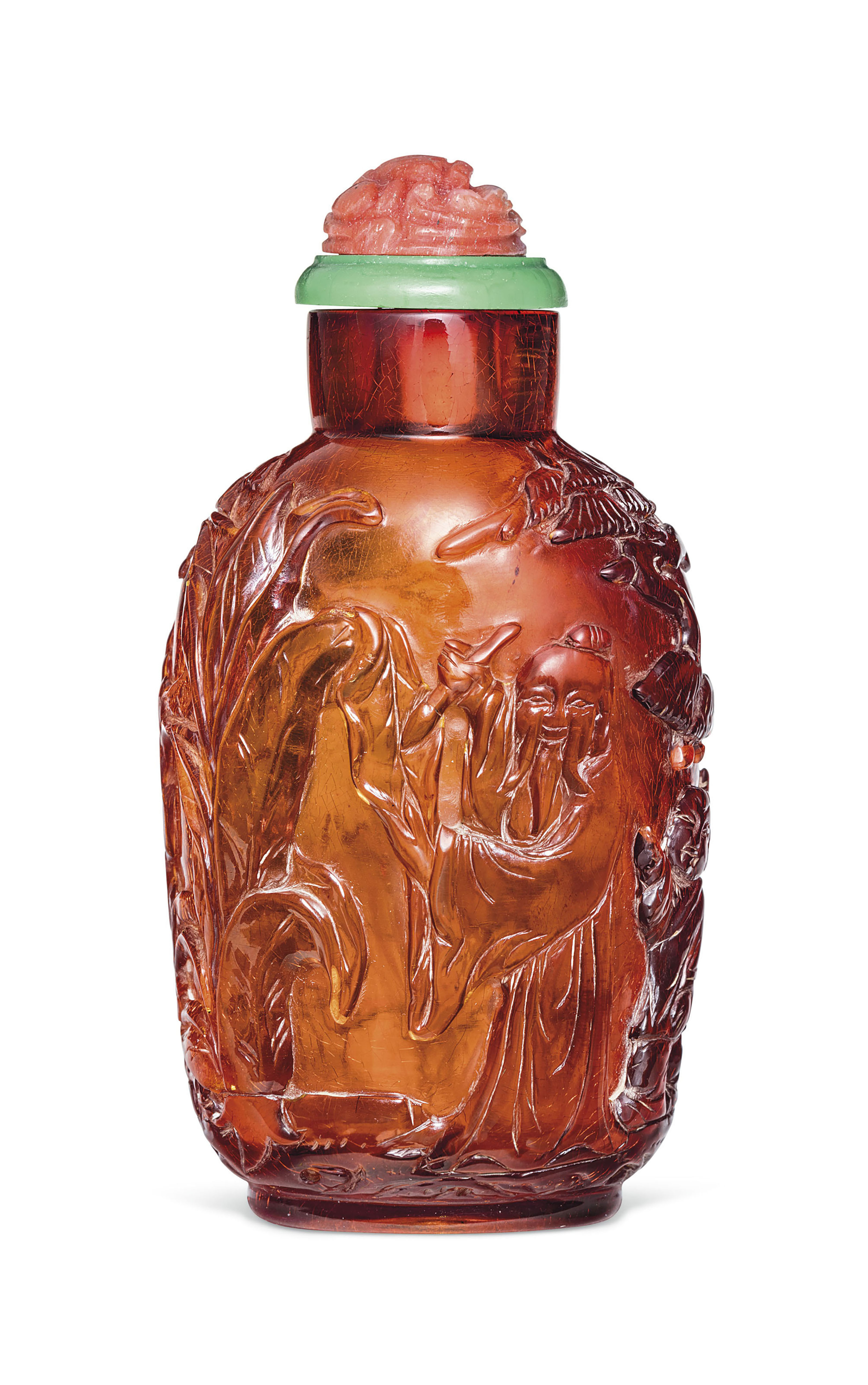 A CARVED AMBER SNUFF BOTTLE