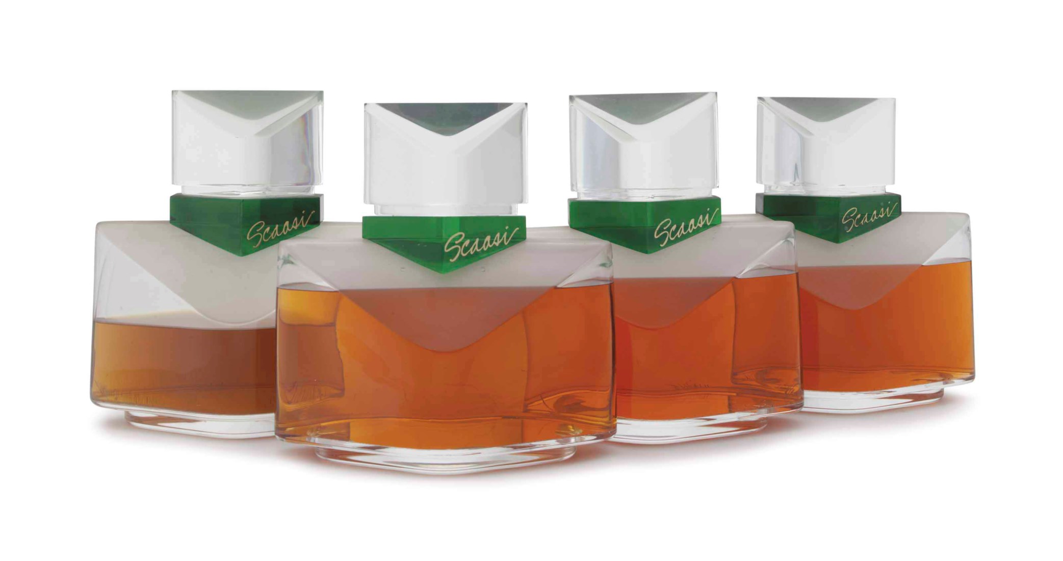 A SET OF FOUR RESIN DISPLAY PERFUME BOTTLES AND COVERS, MODERN | Christie's