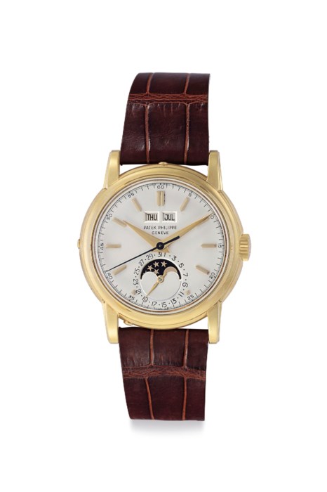 Patek Philippe. A Very Fine and Extremely Rare 18k Gold Perpetual ...