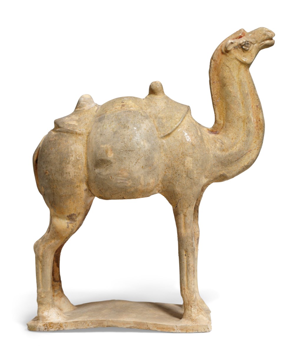 A STRAW-GLAZED POTTERY FIGURE OF A BACTRIAN CAMEL, TANG DYNASTY (AD 618 ...