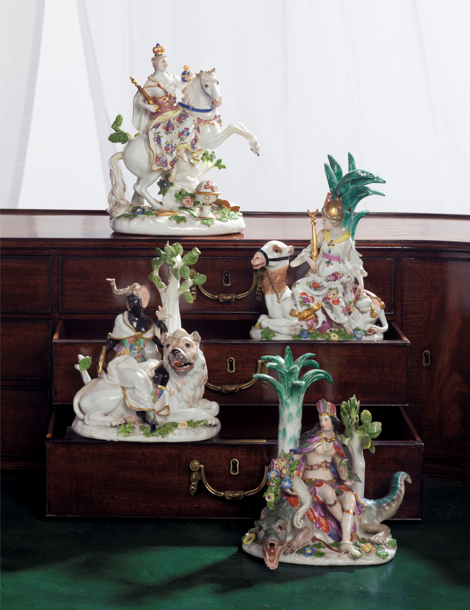 FOUR MEISSEN PORCELAIN FIGURES EMBLEMATIC OF THE CONTINENTS, CIRCA 1745 ...