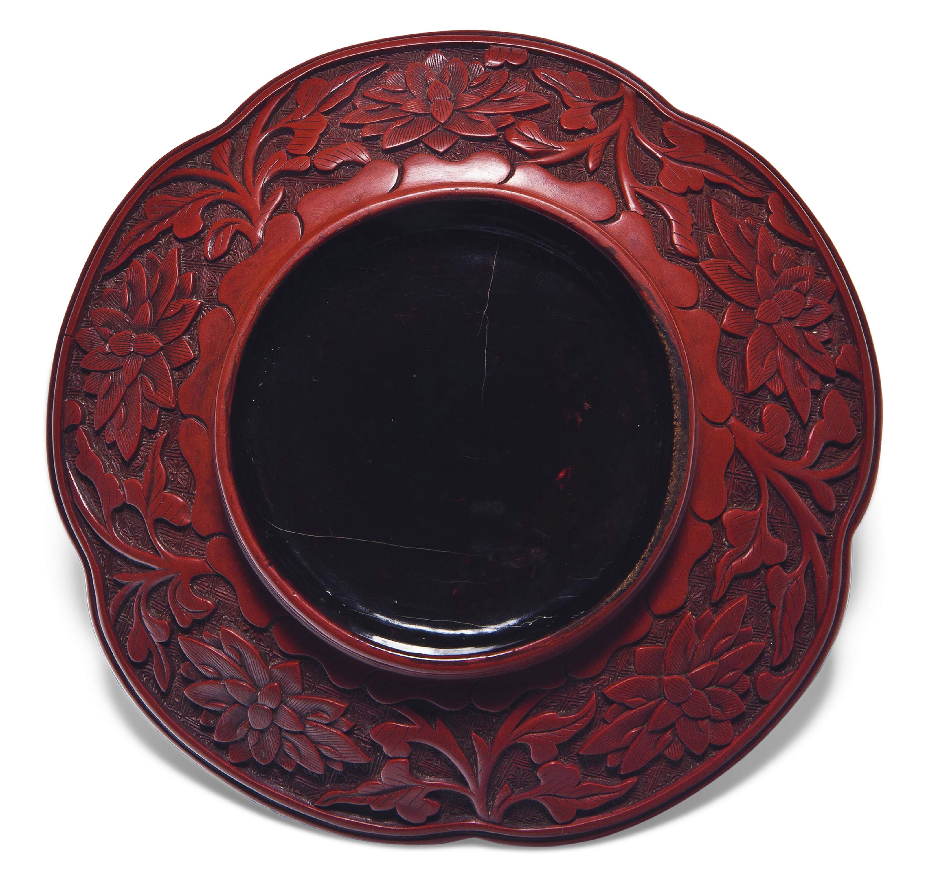 A CARVED CINNABAR LACQUER DISH, LATE MING DYNASTY, 16TH-17TH CENTURY OR ...