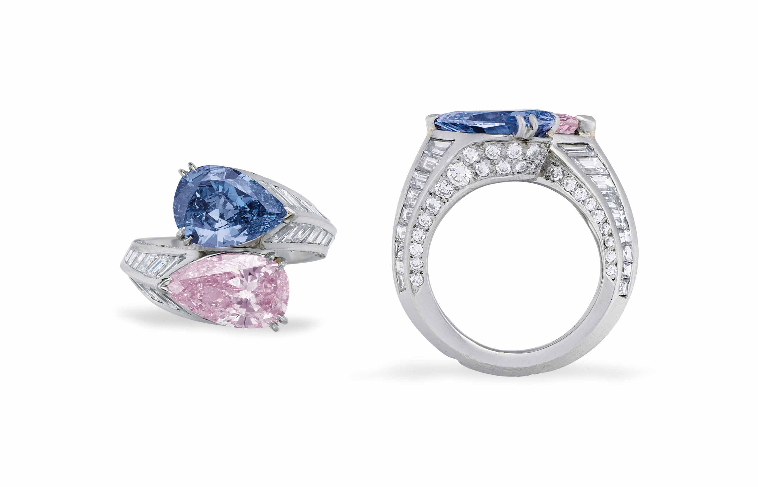 AN EXCEPTIONAL TWIN-STONE COLORED DIAMOND AND DIAMOND RING, BY CARTIER