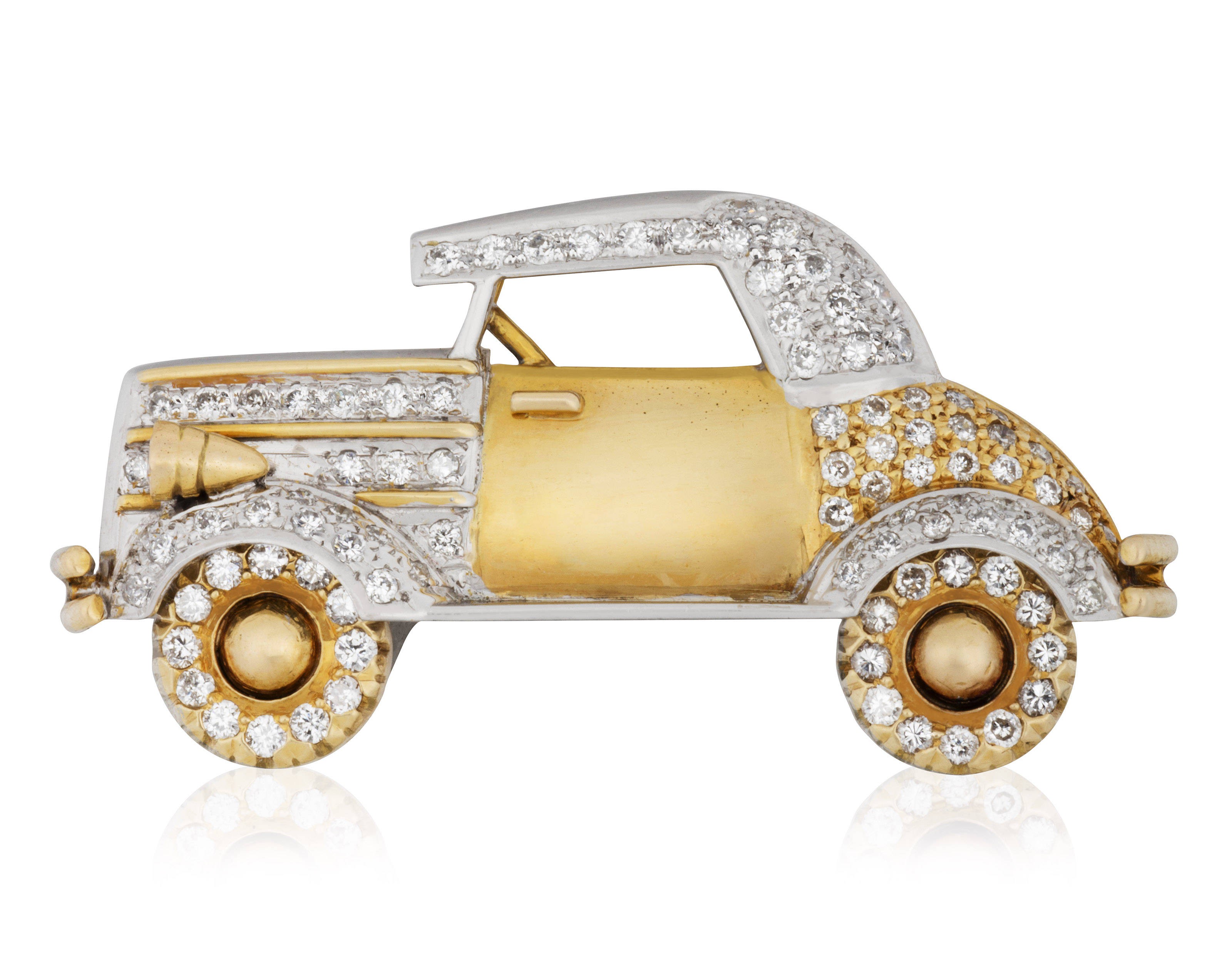 DIAMOND AND GOLD CAR BROOCH, | Christie’s