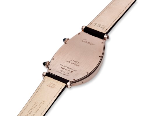 CARTIER, 18K TWO TIME ZONE TONNEAU WATCH, REF. 2806 H, | Christie’s
