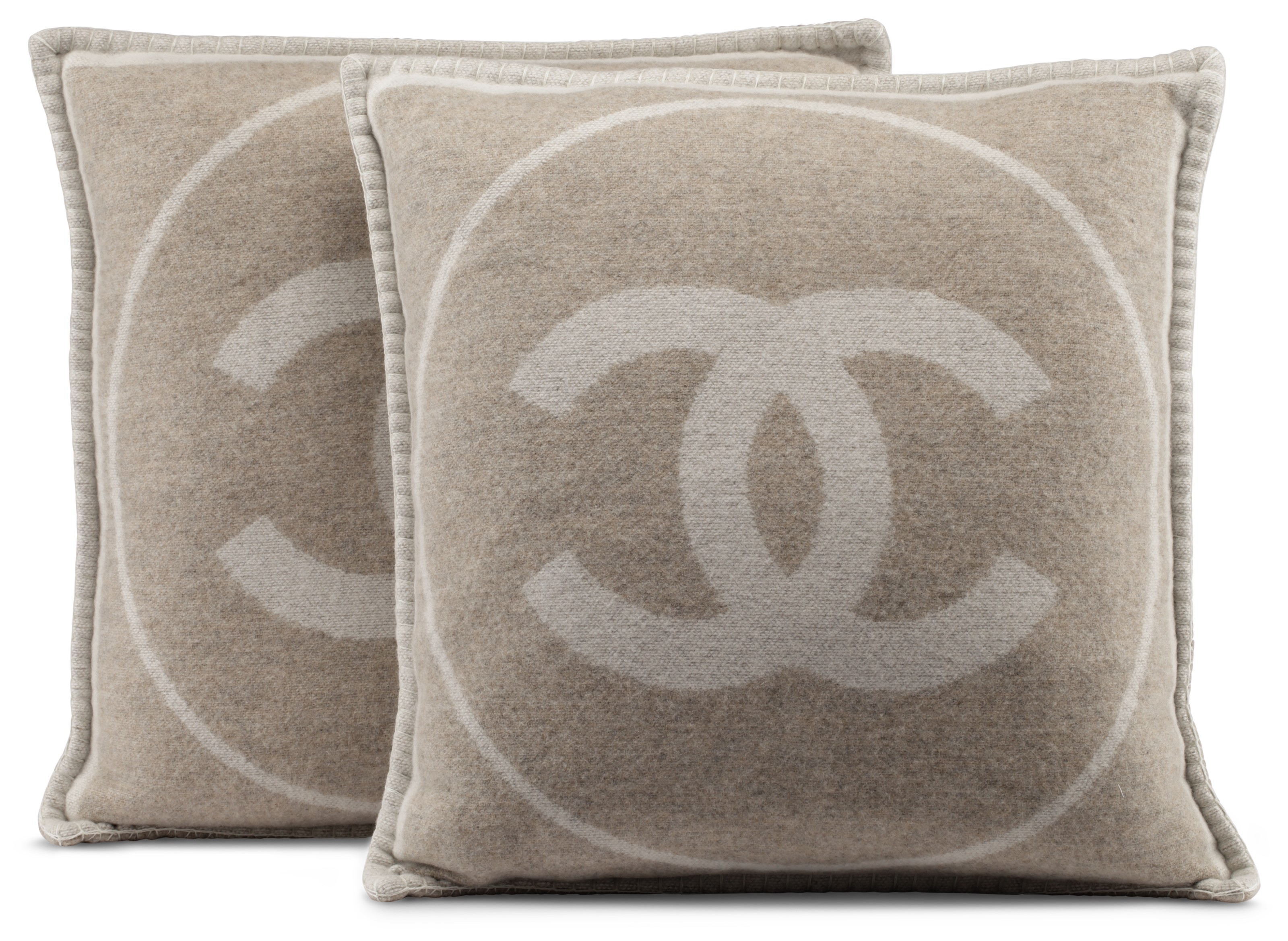 A SET OF TWO IVORY & BEIGE WOOL THROW PILLOWS, CHANEL, 2017 | Christie’s