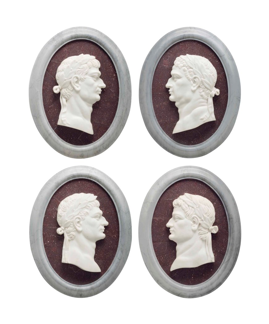 A SET OF FOUR WHITE AND GREY MARBLE AND PORPHYRY PORTRAIT MEDALLIONS ...