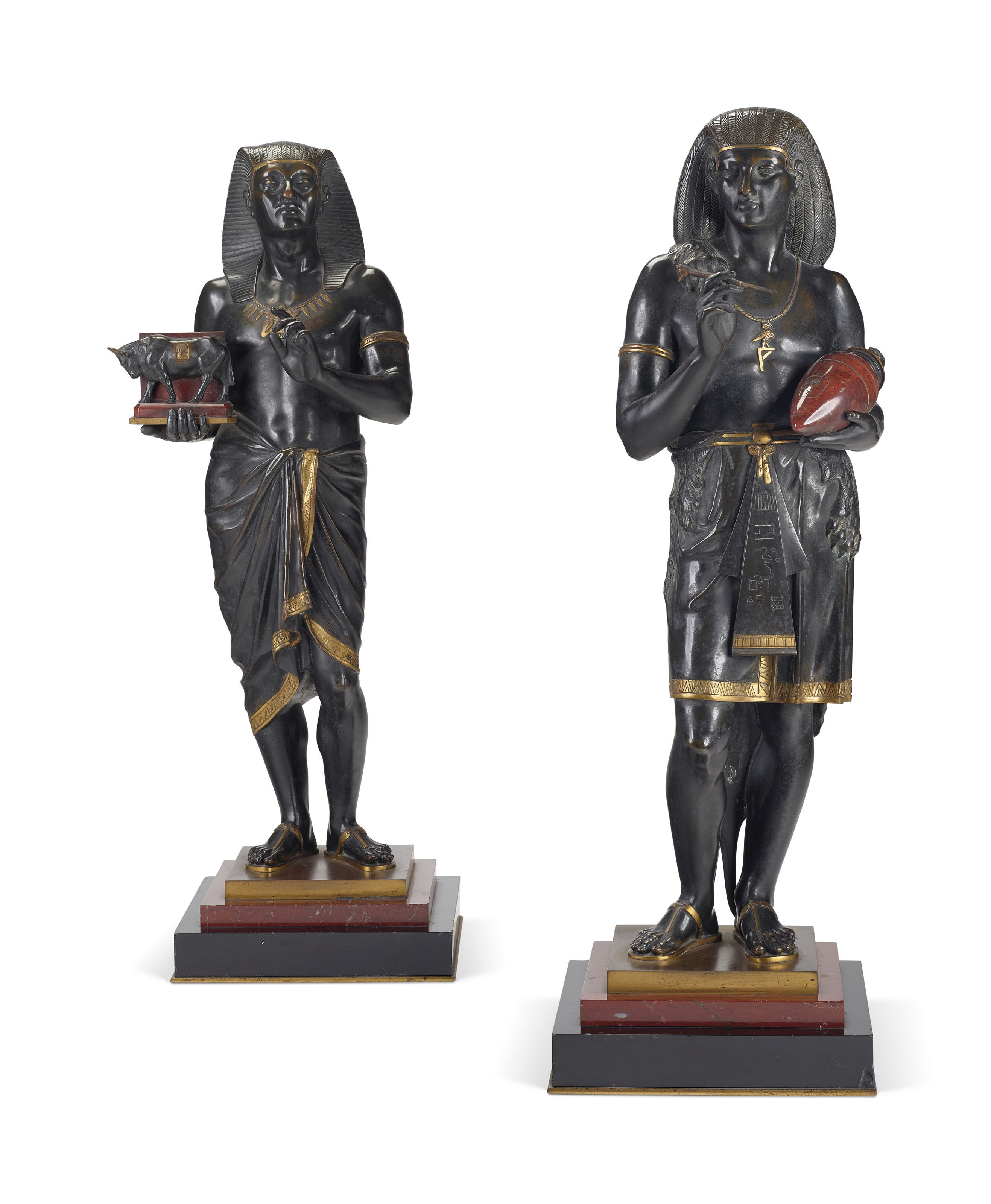 PAIRE DE FIGURES EN BRONZE DORE ET PATINE REPRESENTANT UN SCRIBE ...