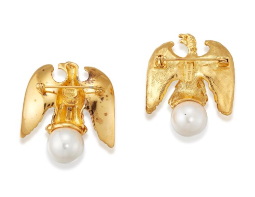 TWO GILT METAL, IMITATION PEARL AND RUBY ‘LIBERTY EAGLE’ BROOCHES AND A ...