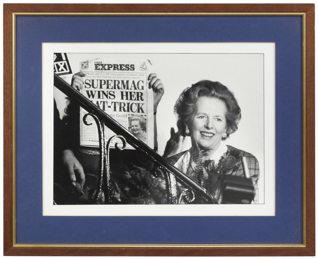 A COLLECTION OF FRAMED PHOTOGRAPHS AND A POSTER RELATING TO MARGARET ...