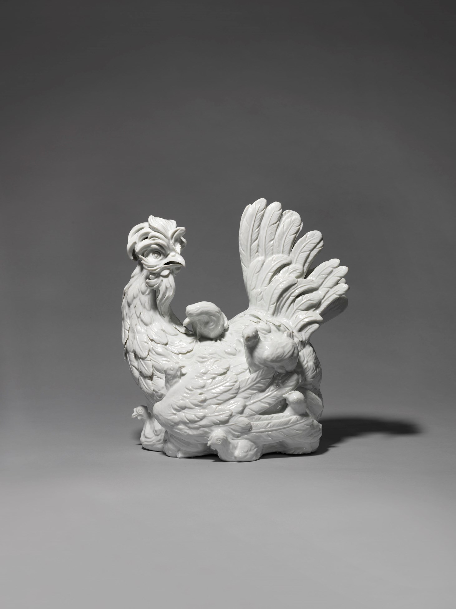 A MEISSEN WHITE PORCELAIN MODEL OF A HEN WITH HER CHICKS, 1732 | Christie's