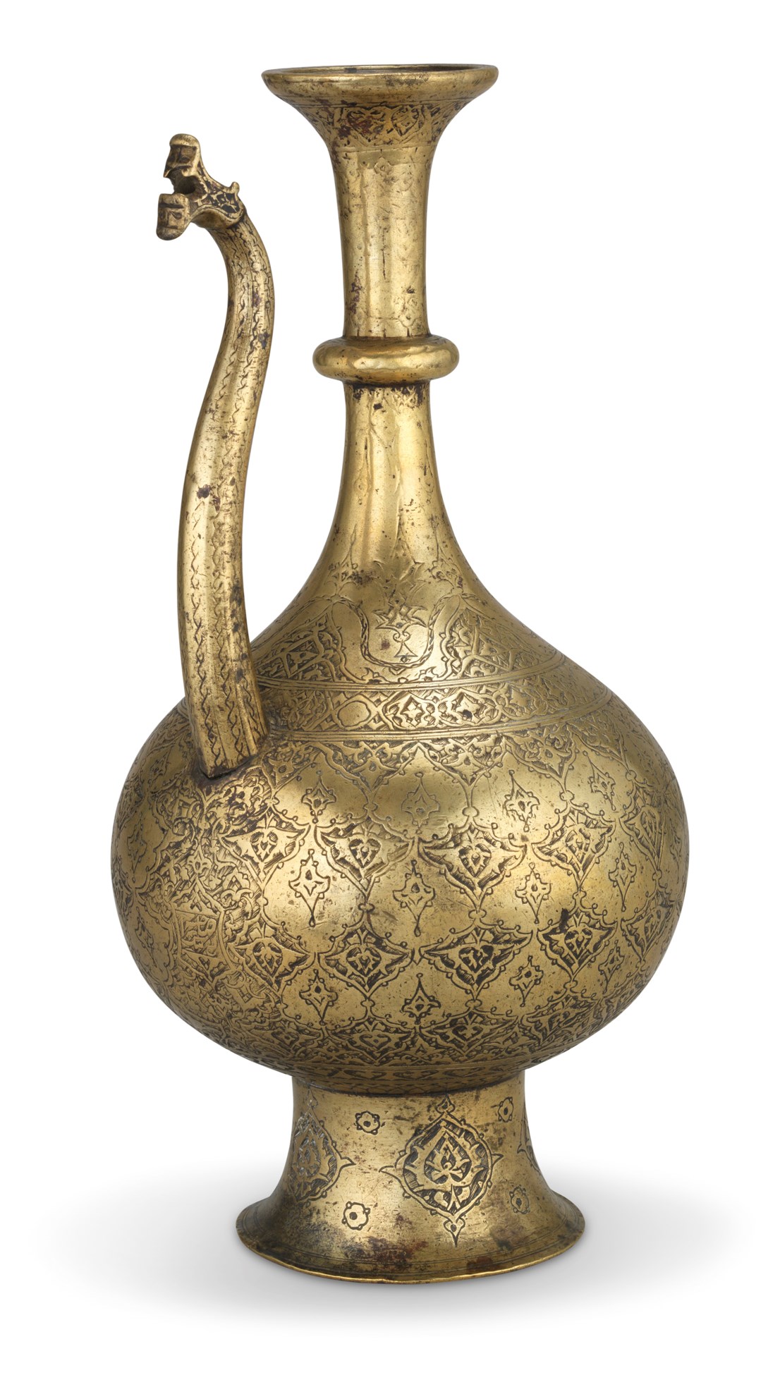 AN ENGRAVED BRASS EWER (AFTABE), SAFAVID IRAN, EARLY 17TH CENTURY ...