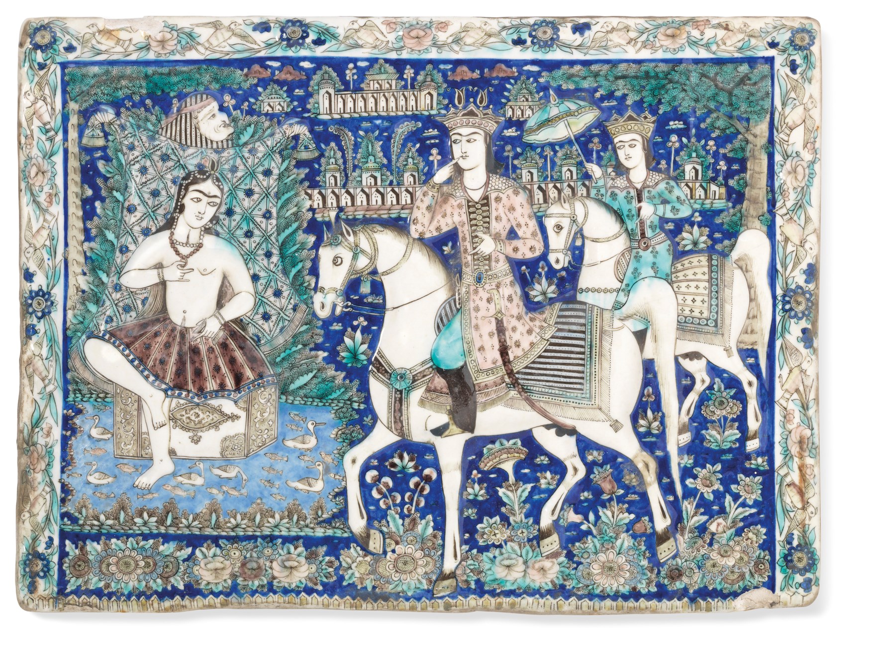 A LARGE QAJAR MOULDED AND GLAZED CERAMIC TILE, QAJAR IRAN, 19TH CENTURY ...