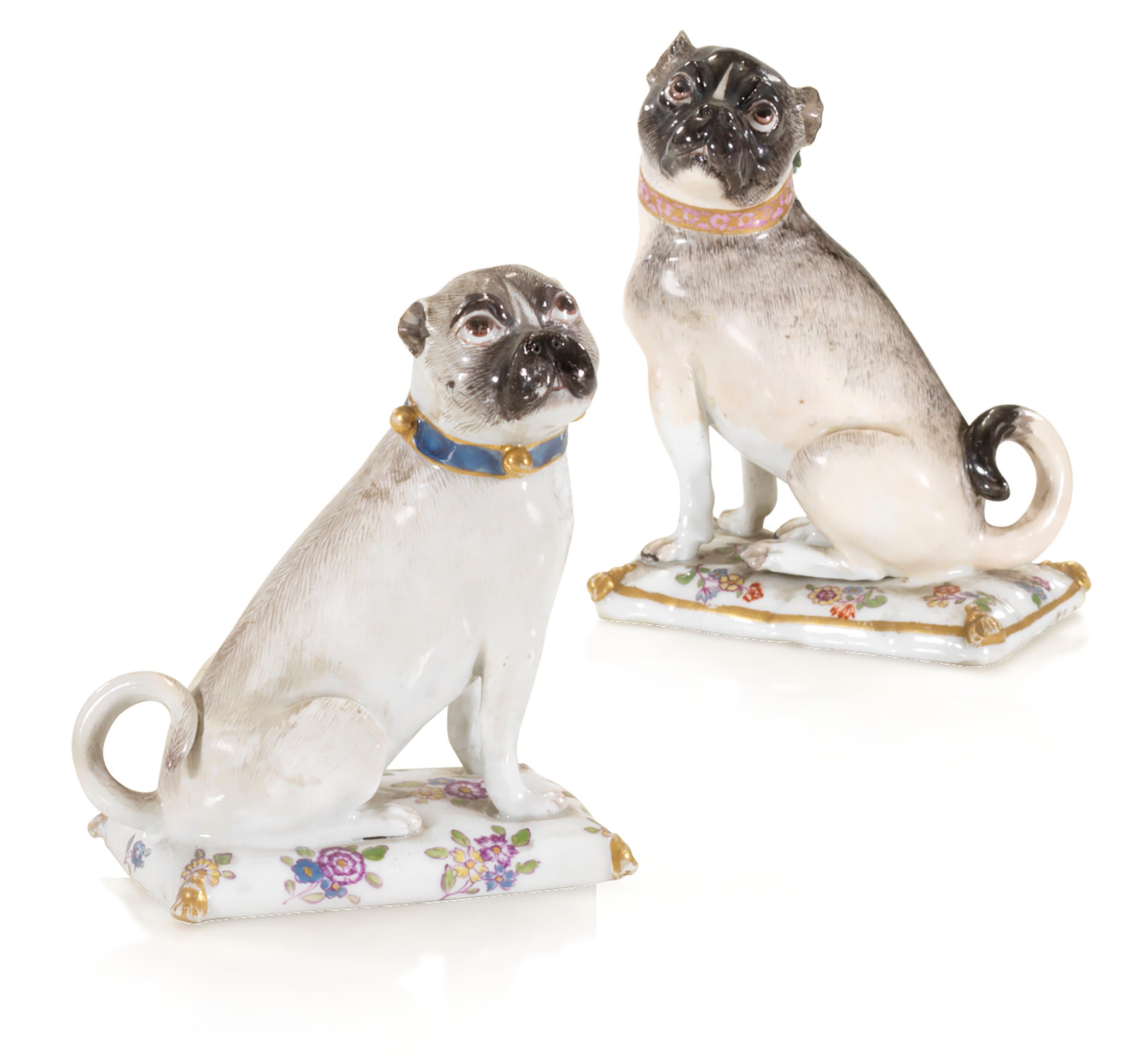 TWO MEISSEN PORCELAIN MODELS OF PUGS, CIRCA 1750, TRACES OF BLUE ...