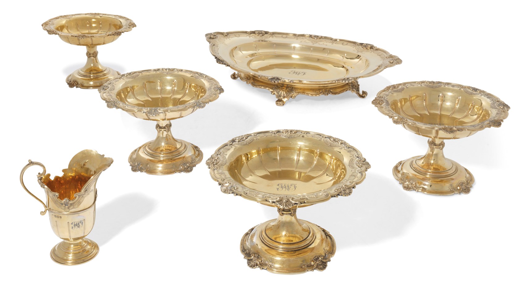A GEORGE V SILVER-GILT SIX-PIECE TABLE GARNITURE, MARK OF THE ...