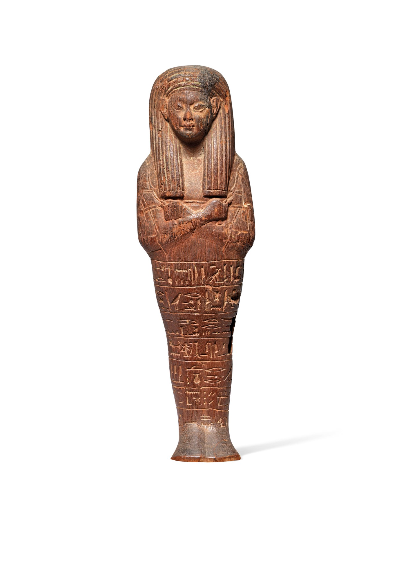 AN EGYPTIAN WOOD SHABTI FOR TAY-SEN-NOFRET, NEW KINGDOM, LATE 18TH-19TH ...