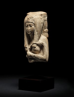 AN EGYPTIAN LIMESTONE BUST OF THE PRINCESS HENUT-TANEB