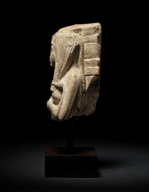 AN EGYPTIAN LIMESTONE BUST OF THE PRINCESS HENUT-TANEB