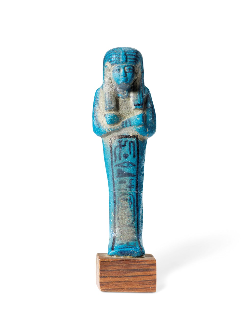 AN EGYPTIAN BLUE FAIENCE SHABTI FOR THE HIGH PRIEST OF AMUN AT THEBES ...