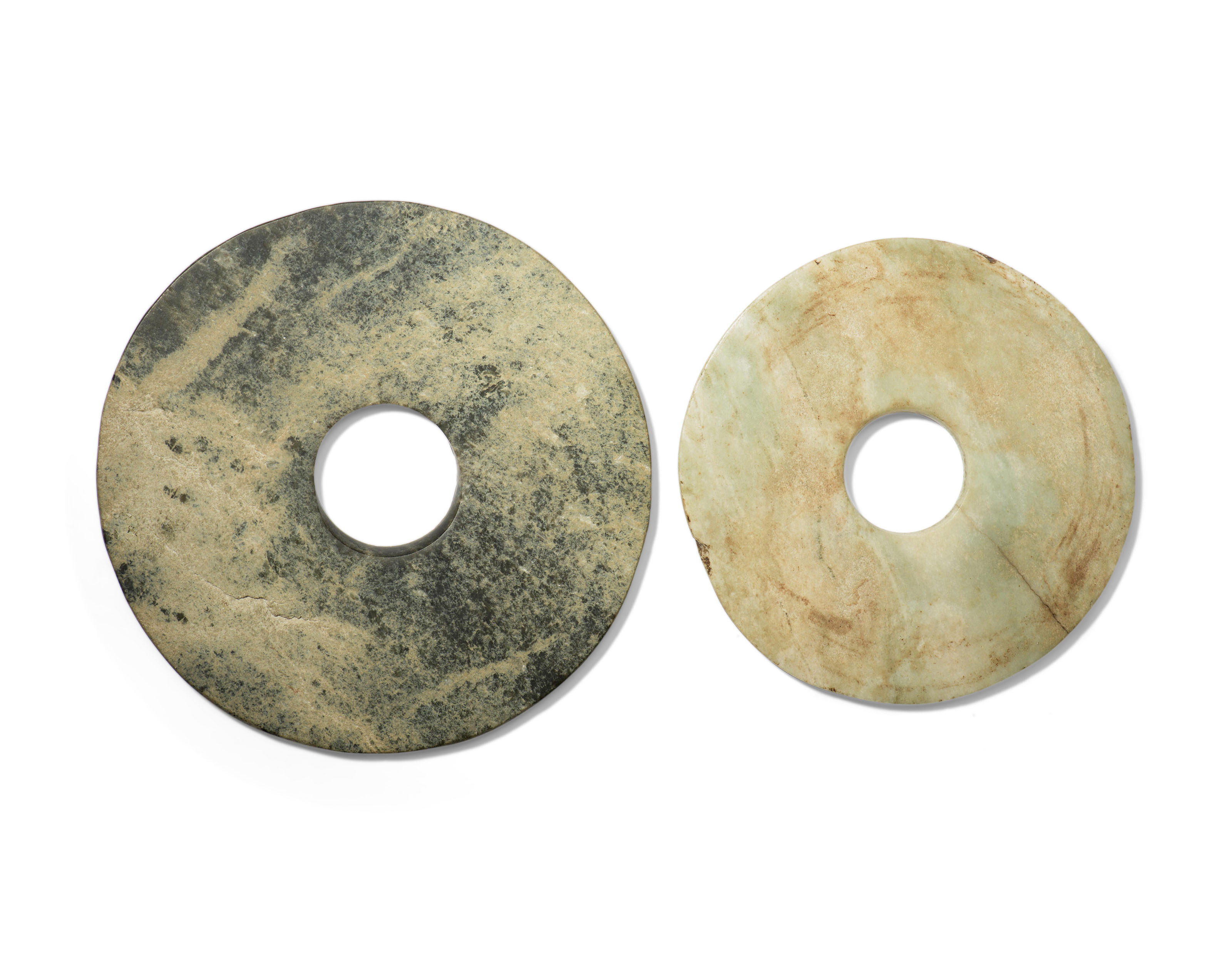 TWO JADE BI DISCS, NEOLITHIC PERIOD (C. 6500-1700 BC) | Christie’s