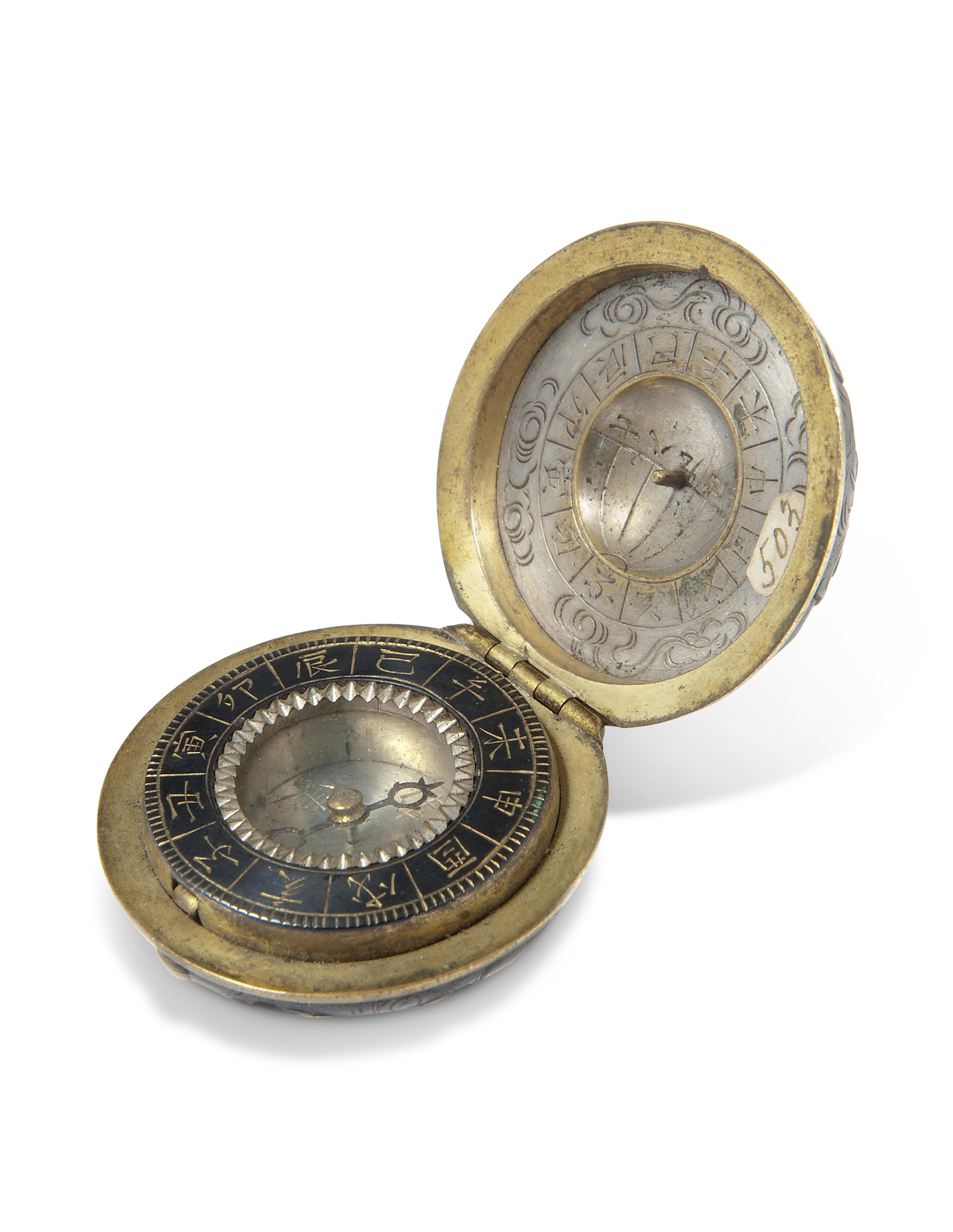 A SILVER AND GILT-METAL MANJU COMPASS, EDO PERIOD (19TH CENTURY ...