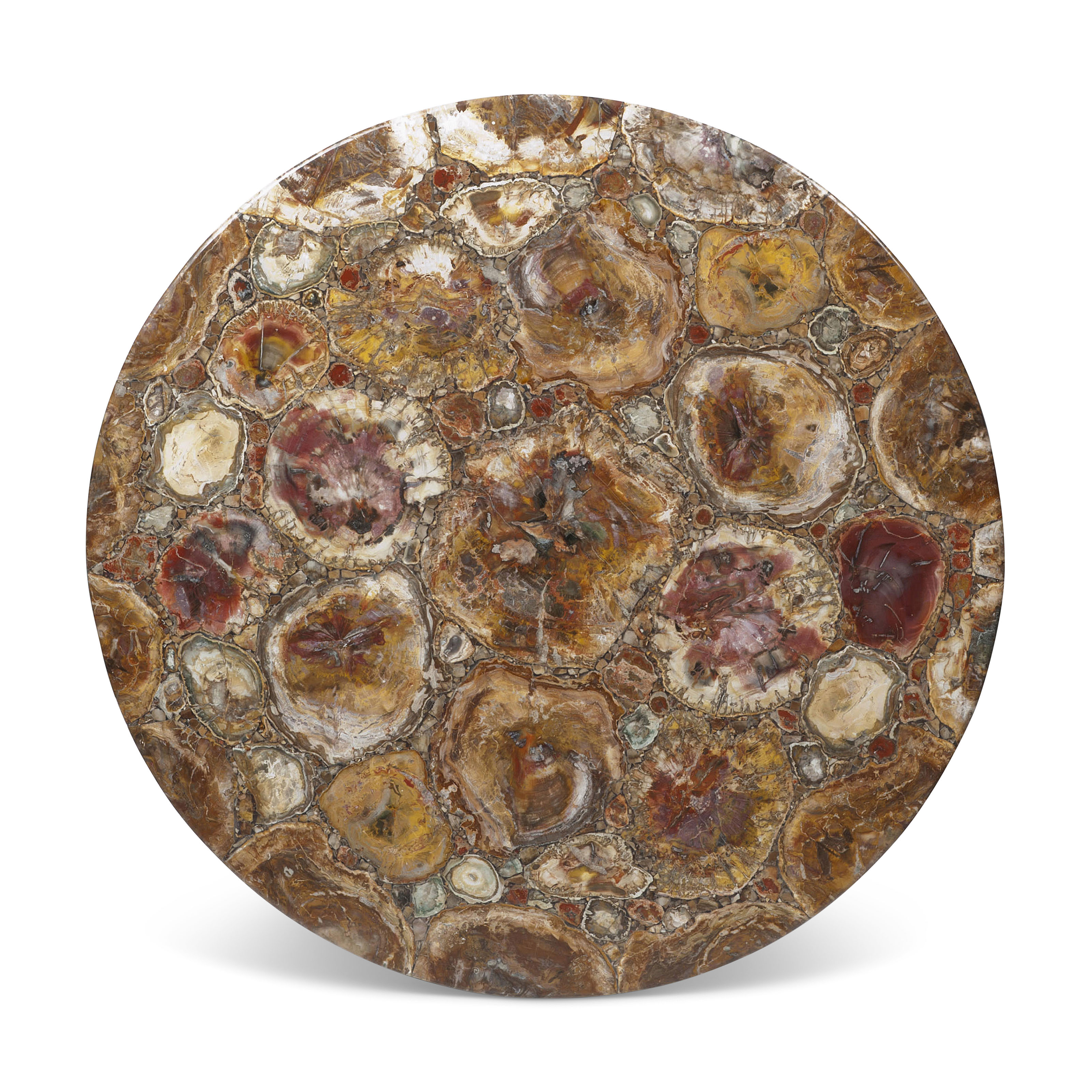 A PETRIFIED WOOD TABLE TOP, MADAGASCAR | Christie’s