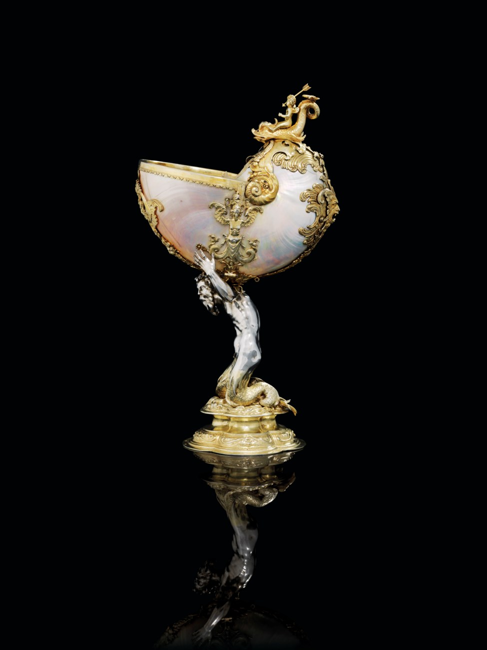 A GERMAN PARCEL-GILT SILVER-MOUNTED NAUTILUS SHELL CUP, MARK OF ...