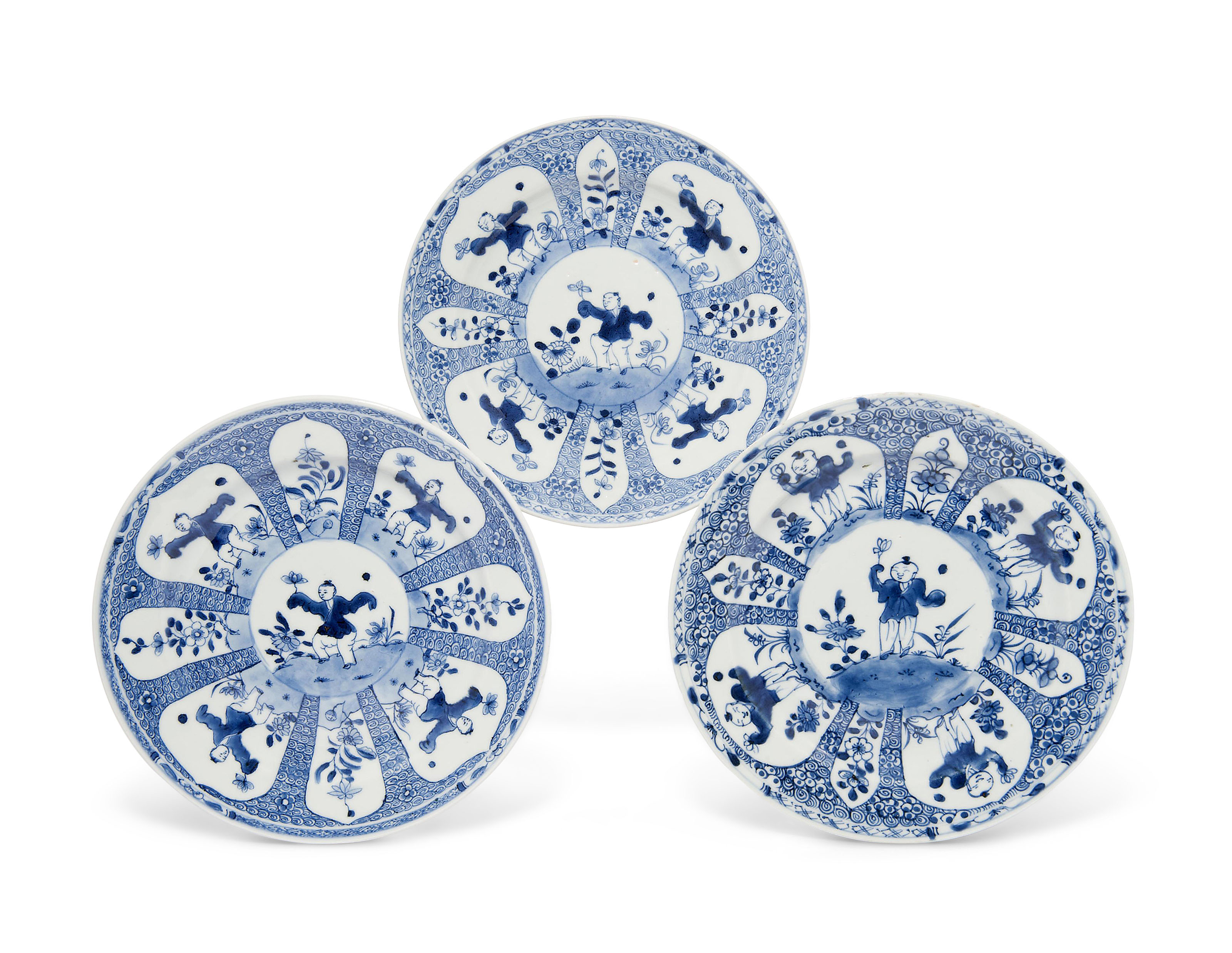 A SET OF THREE BLUE AND WHITE 'BOYS' PLATES, KANGXI PERIOD (1662-1722 ...