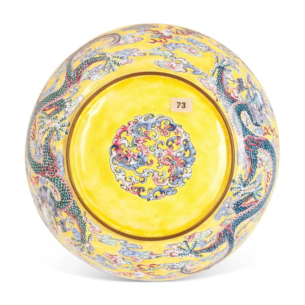 A PAINTED ENAMEL YELLOW-GROUND 'DRAGON' DISH, QIANLONG PERIOD (1736 ...