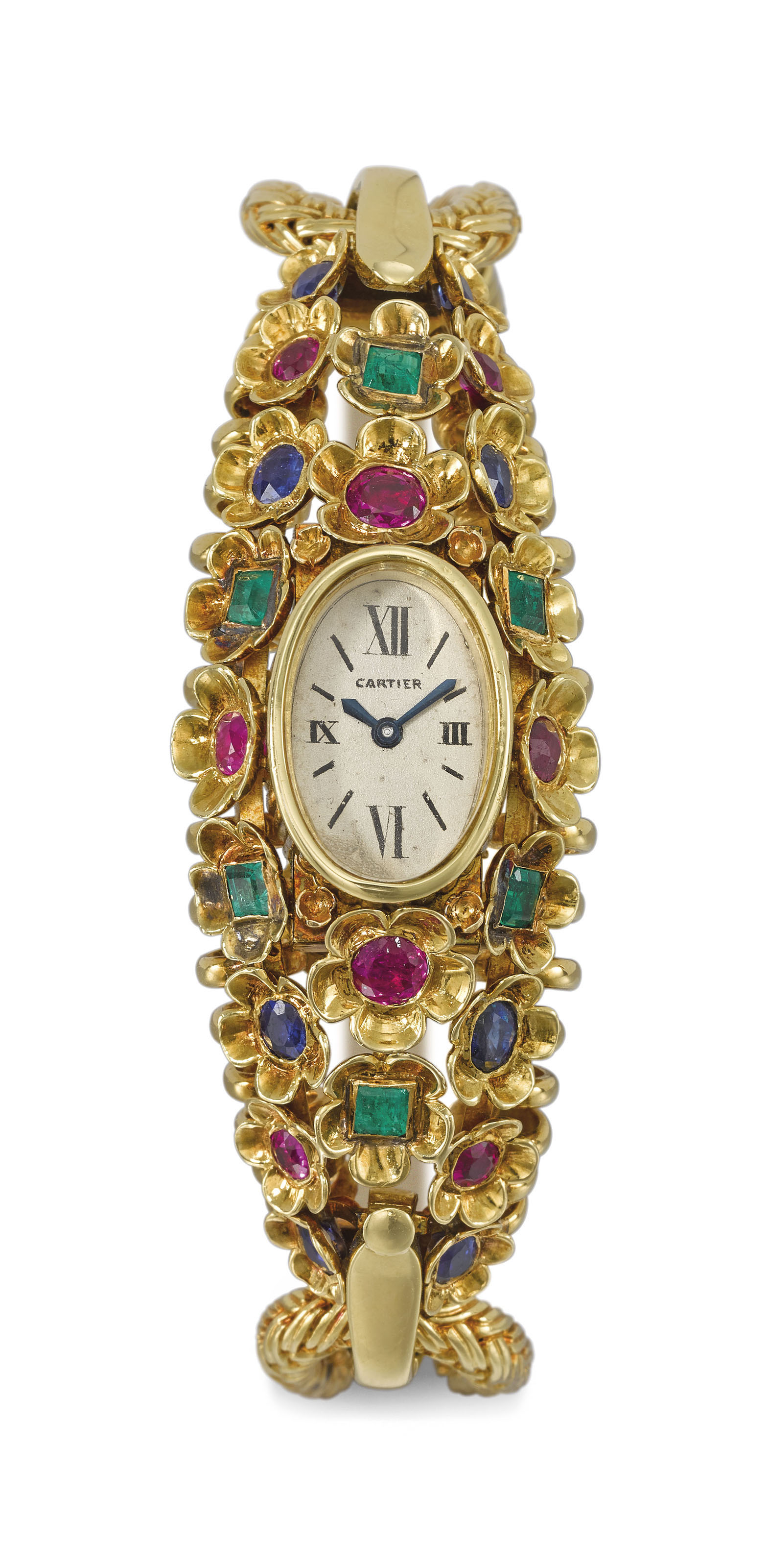 Cartier. A fine, rare and very attractive 18K gold, emerald, ruby and ...