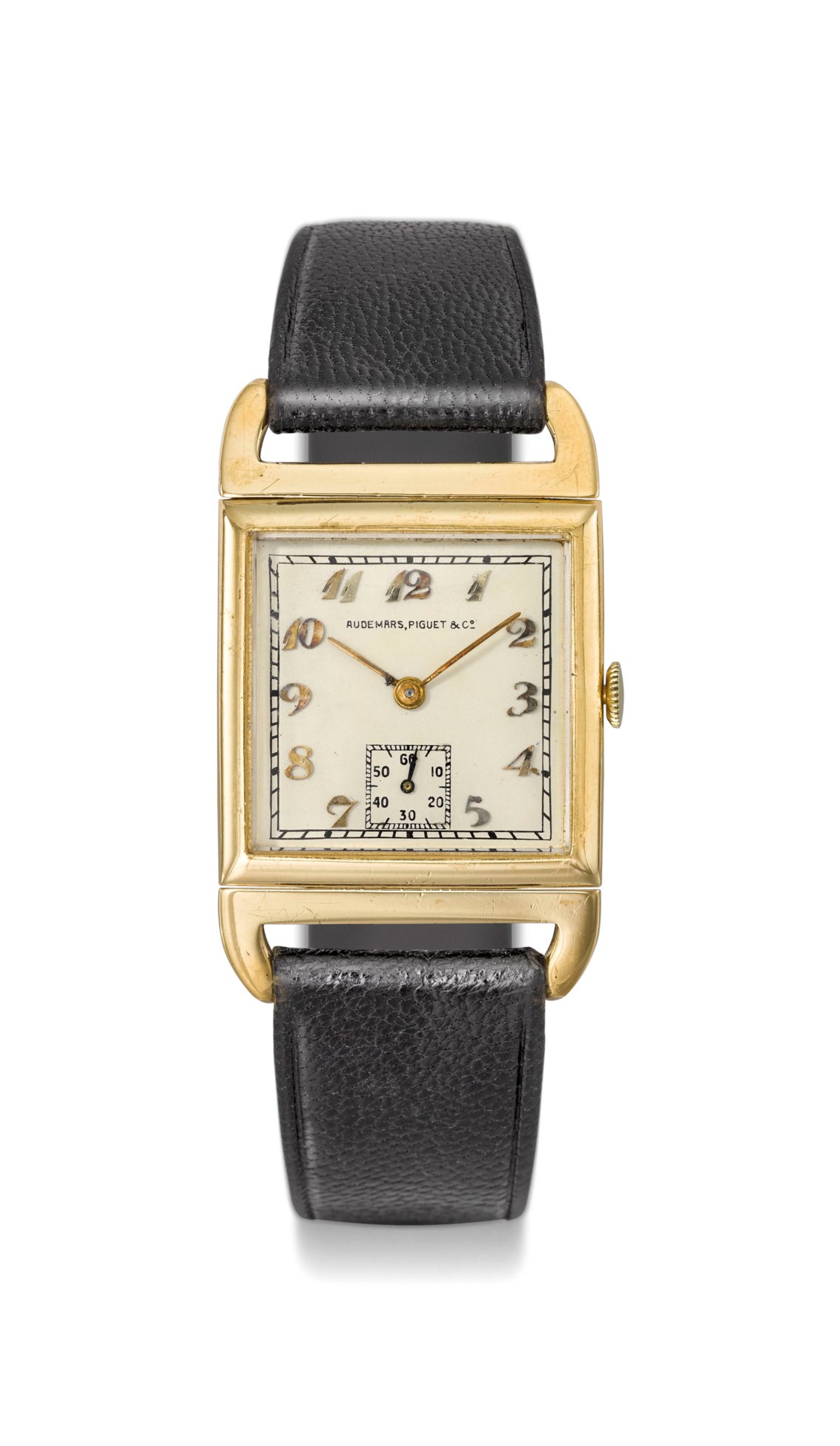 Audemars Piguet. An unusual 18K gold square wristwatch with flexible ...