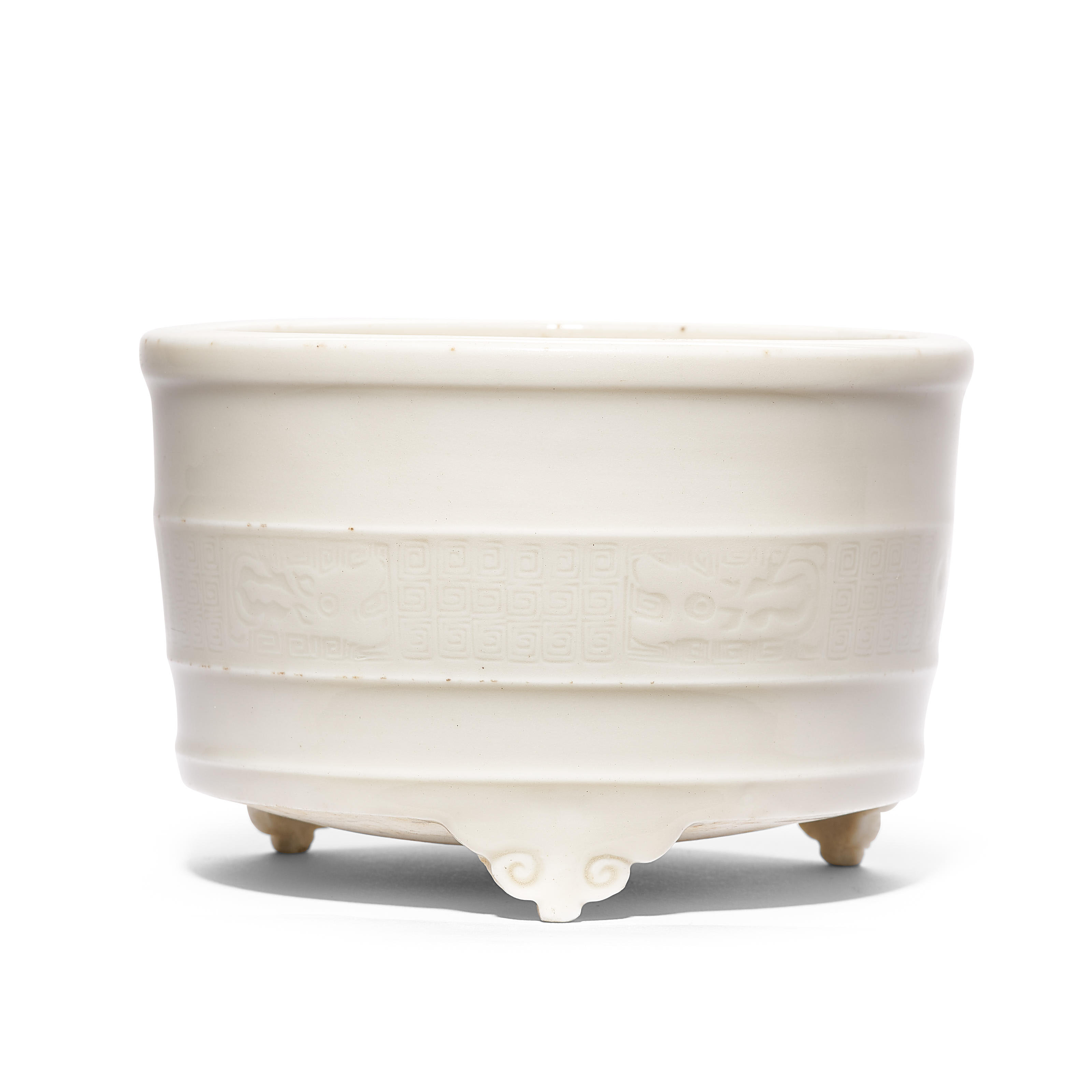 A DEHUA CYLINDRICAL TRIPOD CENSER, MING DYNASTY, 17TH CENTURY | Christie’s