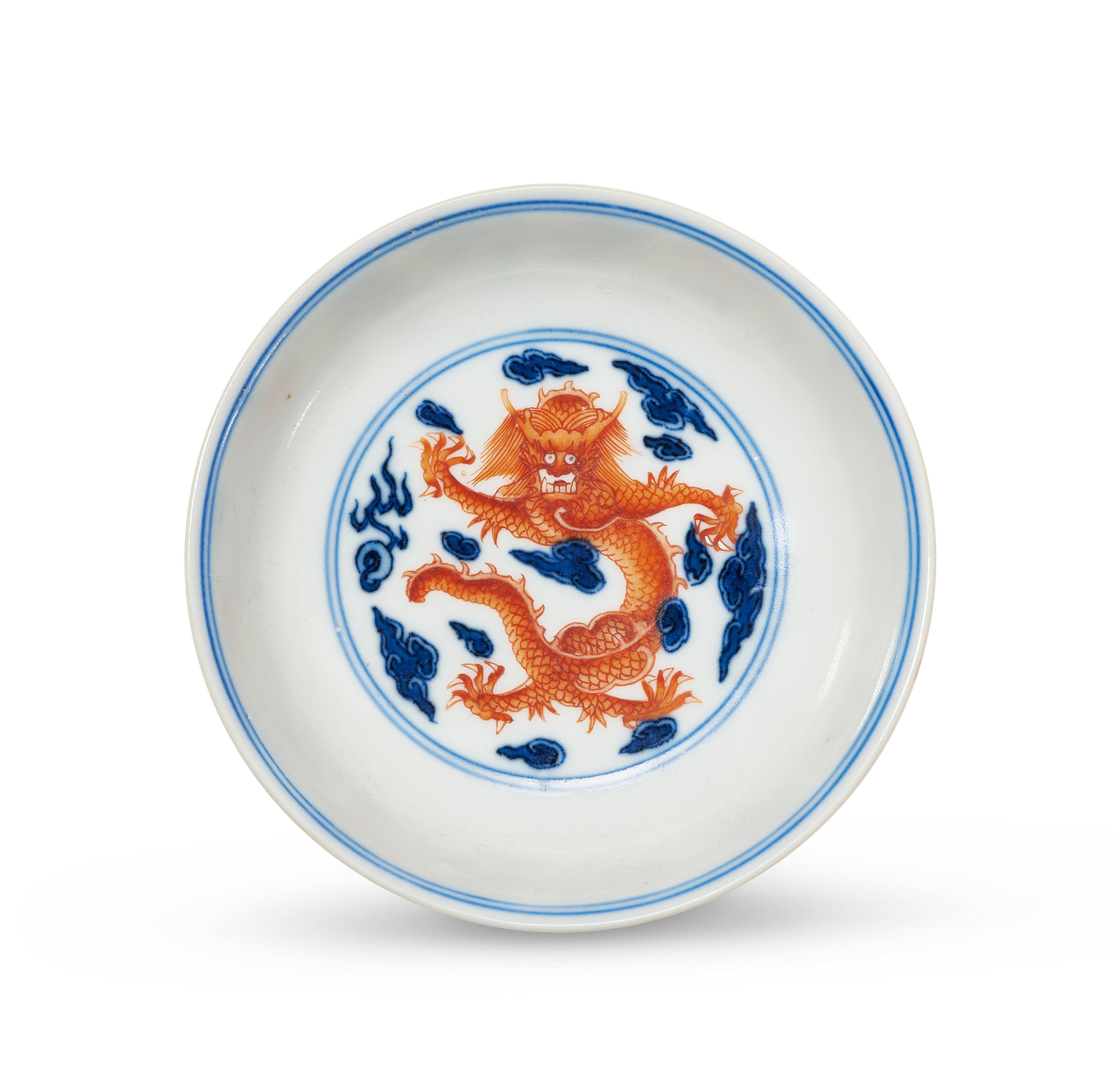 A SMALL IRON-RED AND UNDERGLAZE-BLUE ‘DRAGON’ DISH, JIAQING SIX ...