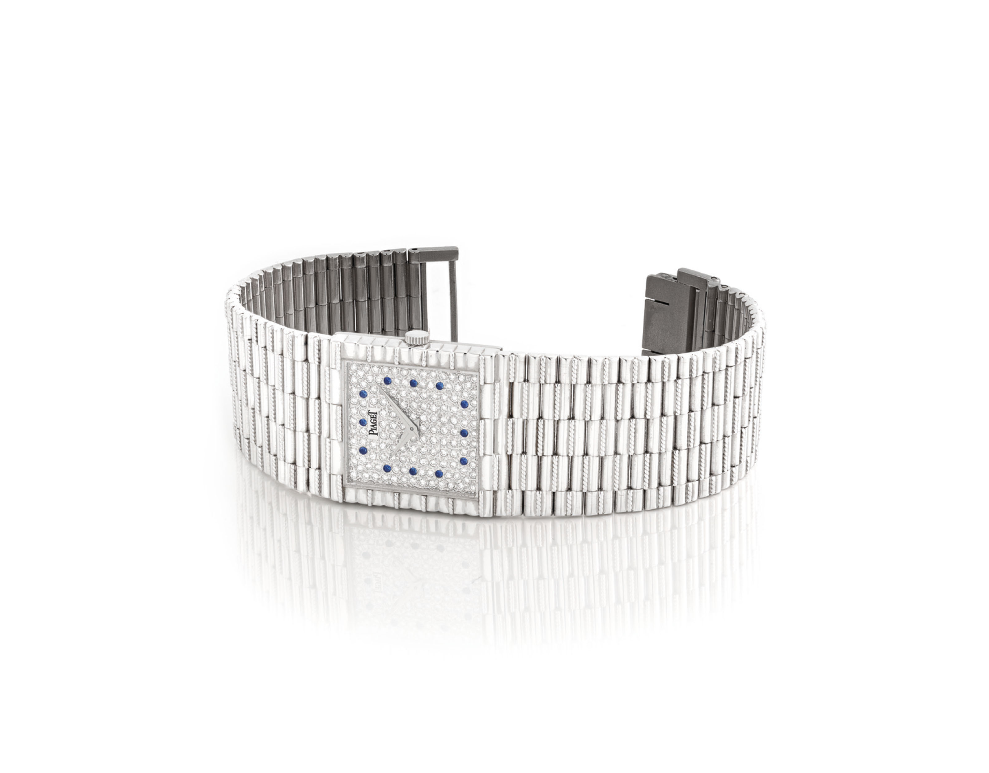 PIAGET. A FINE 18K WHITE GOLD SQUARE BRACELET WATCH WITH DIAMOND AND ...