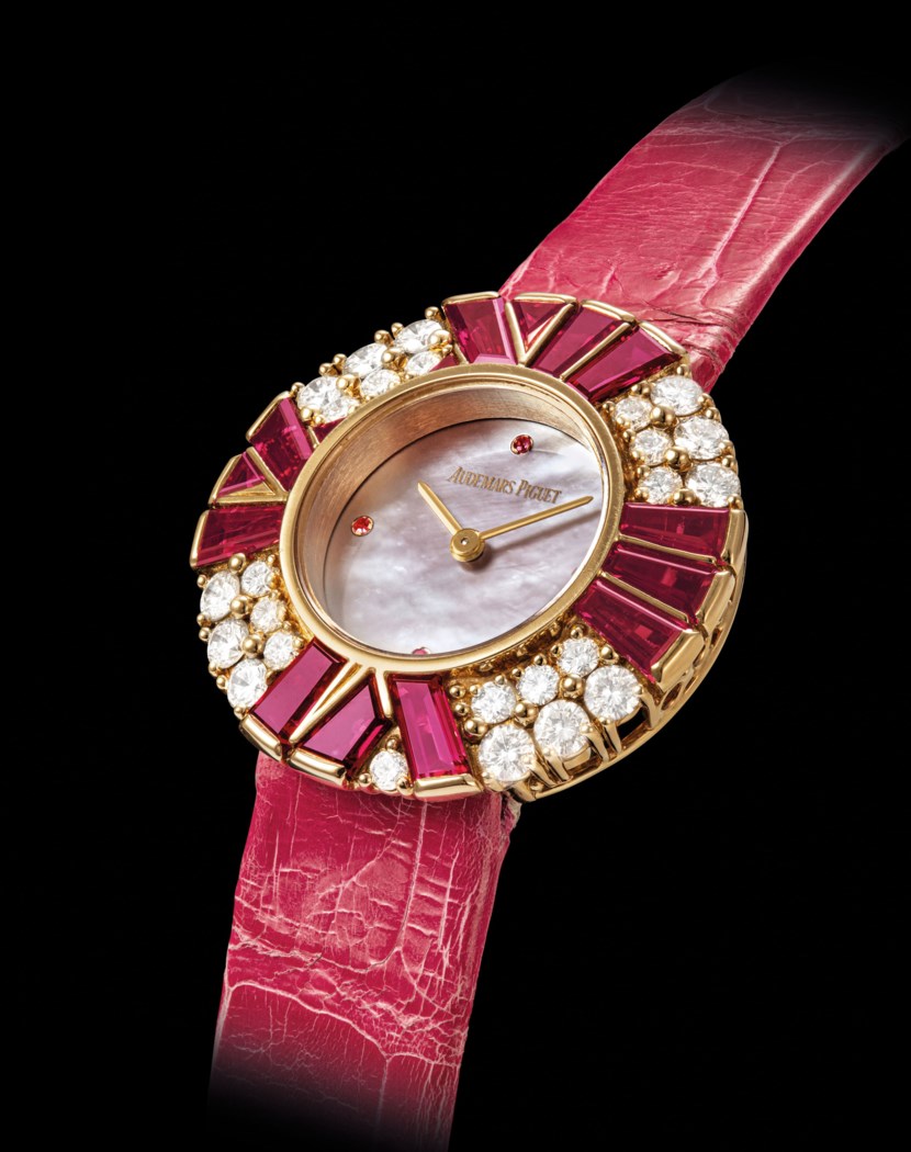AUDEMARS PIGUET. A LADY'S FINE AND ELEGANT 18K GOLD, DIAMOND AND RUBY ...