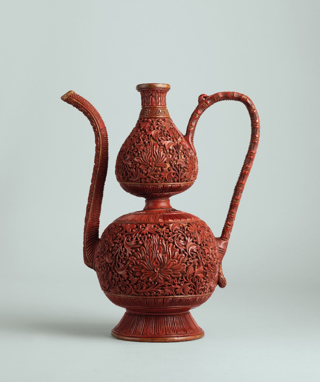 A RARE CARVED CINNABAR LACQUER DOUBLE-GOURD EWER, MING DYNASTY, 15th ...