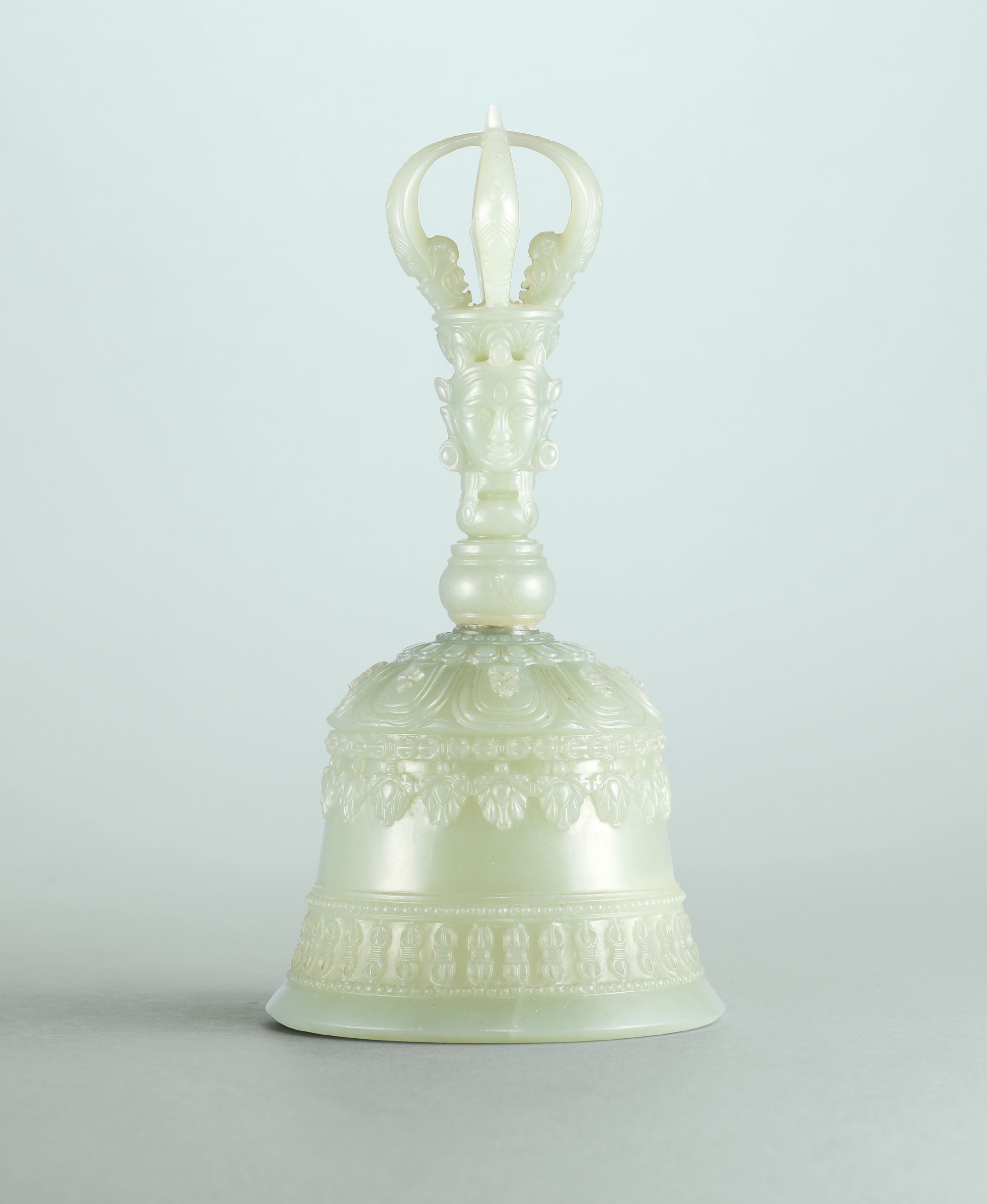 A RARE CELADON JADE RITUAL BELL