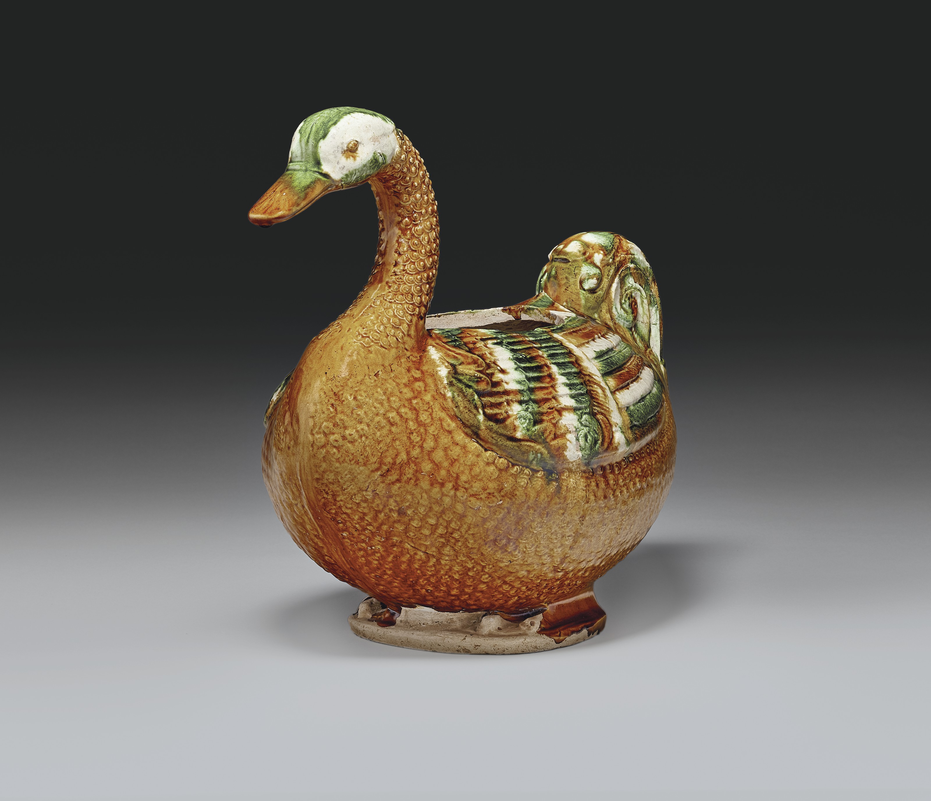 A VERY RARE SANCAI-GLAZED POTTERY GOOSE-FORM VESSEL
