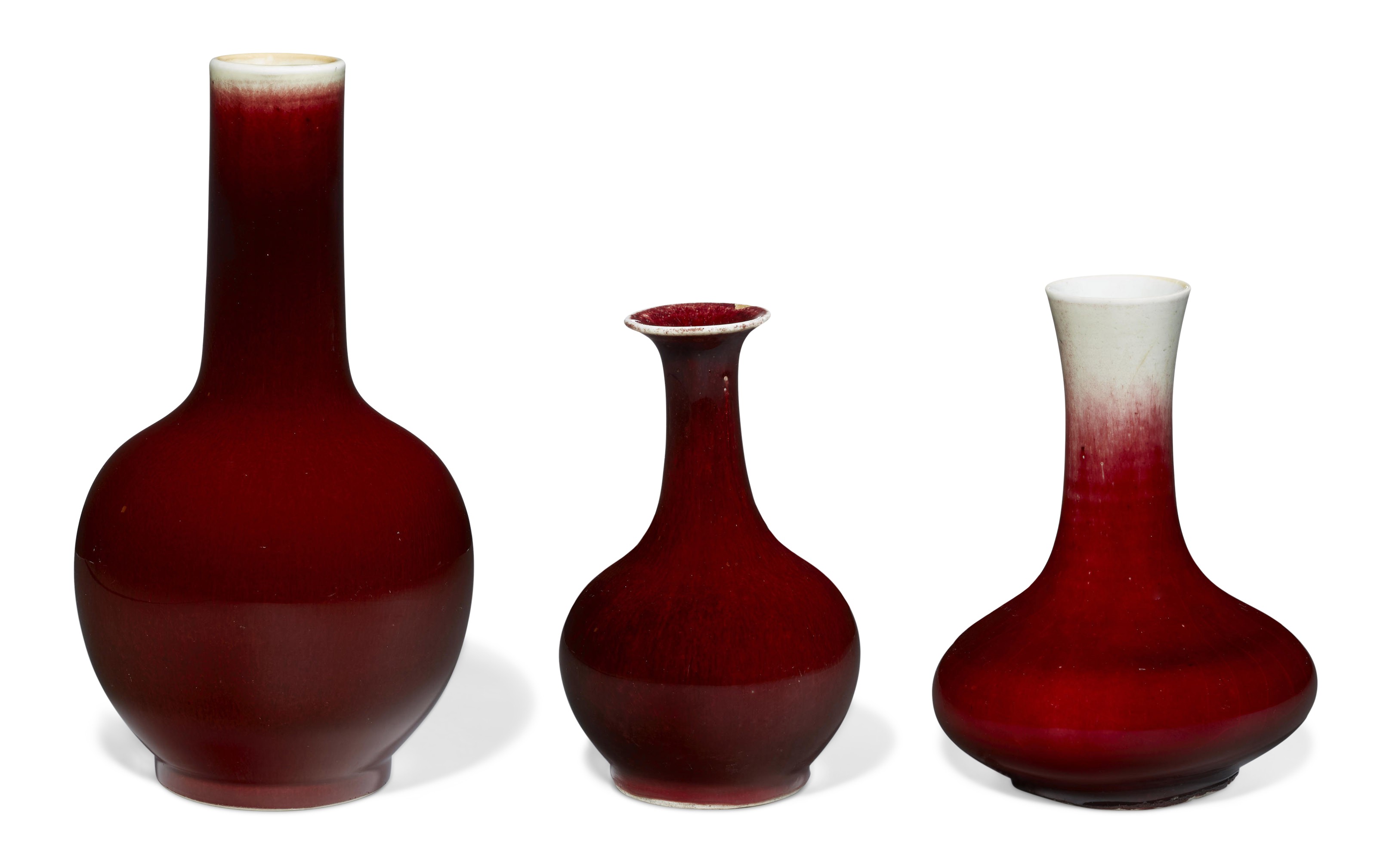 THREE COPPER-RED-GLAZED BOTTLE VASES, 18TH-19TH CENTURY | Christie’s