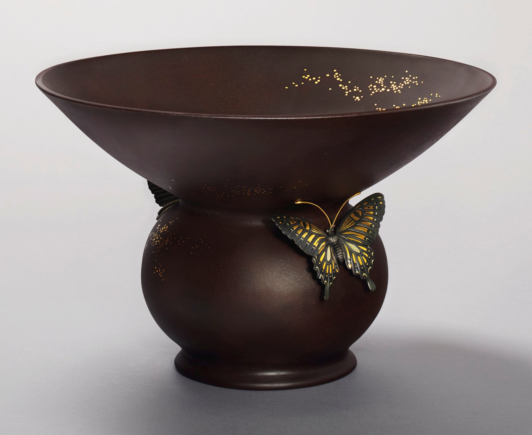 A soft-metal-inlaid iron vase, Meiji period (dated 1909), inscribed ...