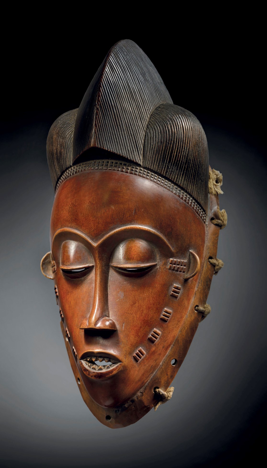 A GURO MASK REPRESENTING GU