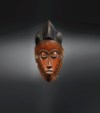 A GURO MASK REPRESENTING GU, IVORY COAST | Christie's