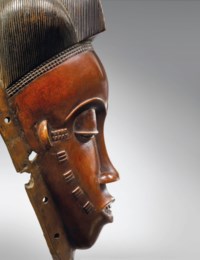 A GURO MASK REPRESENTING GU, IVORY COAST | Christie's