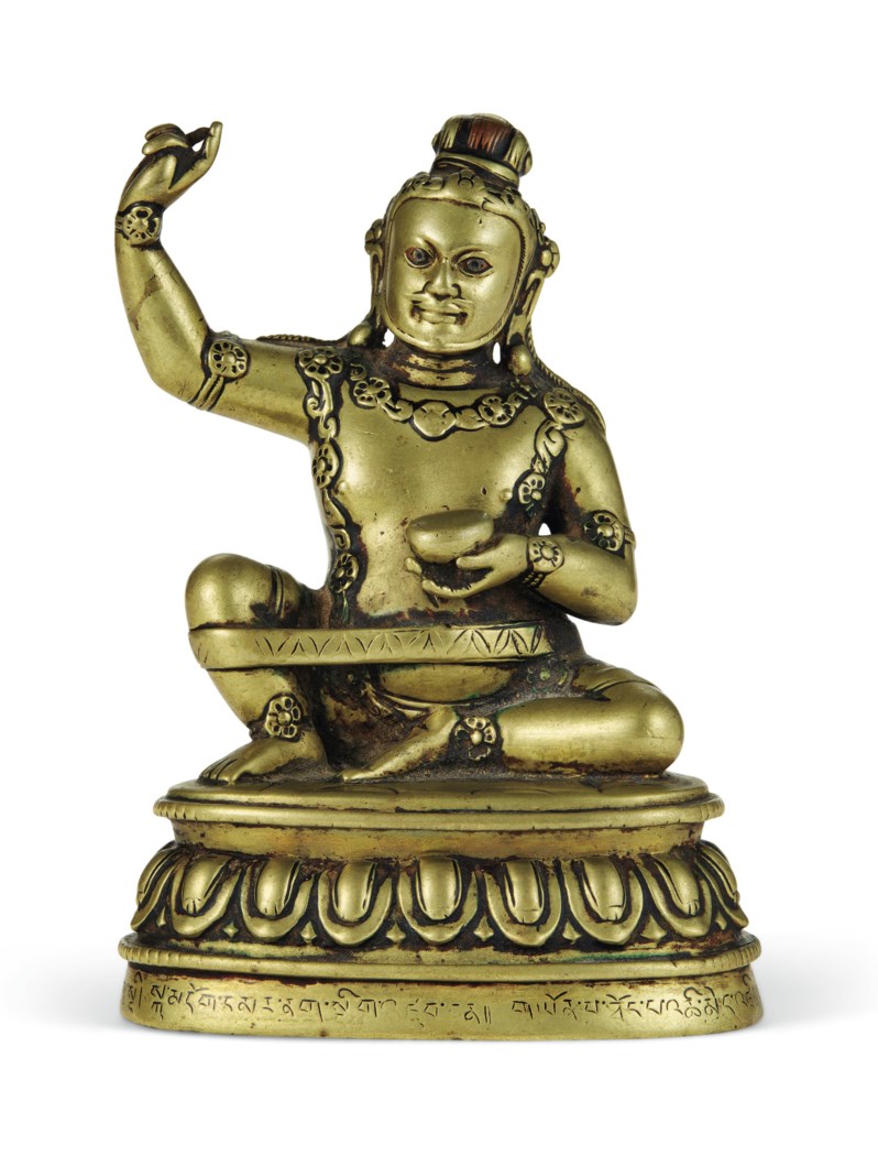 A SILVER- AND COPPER-INLAID BRONZE FIGURE OF VIRUPA, TIBET, 14TH ...