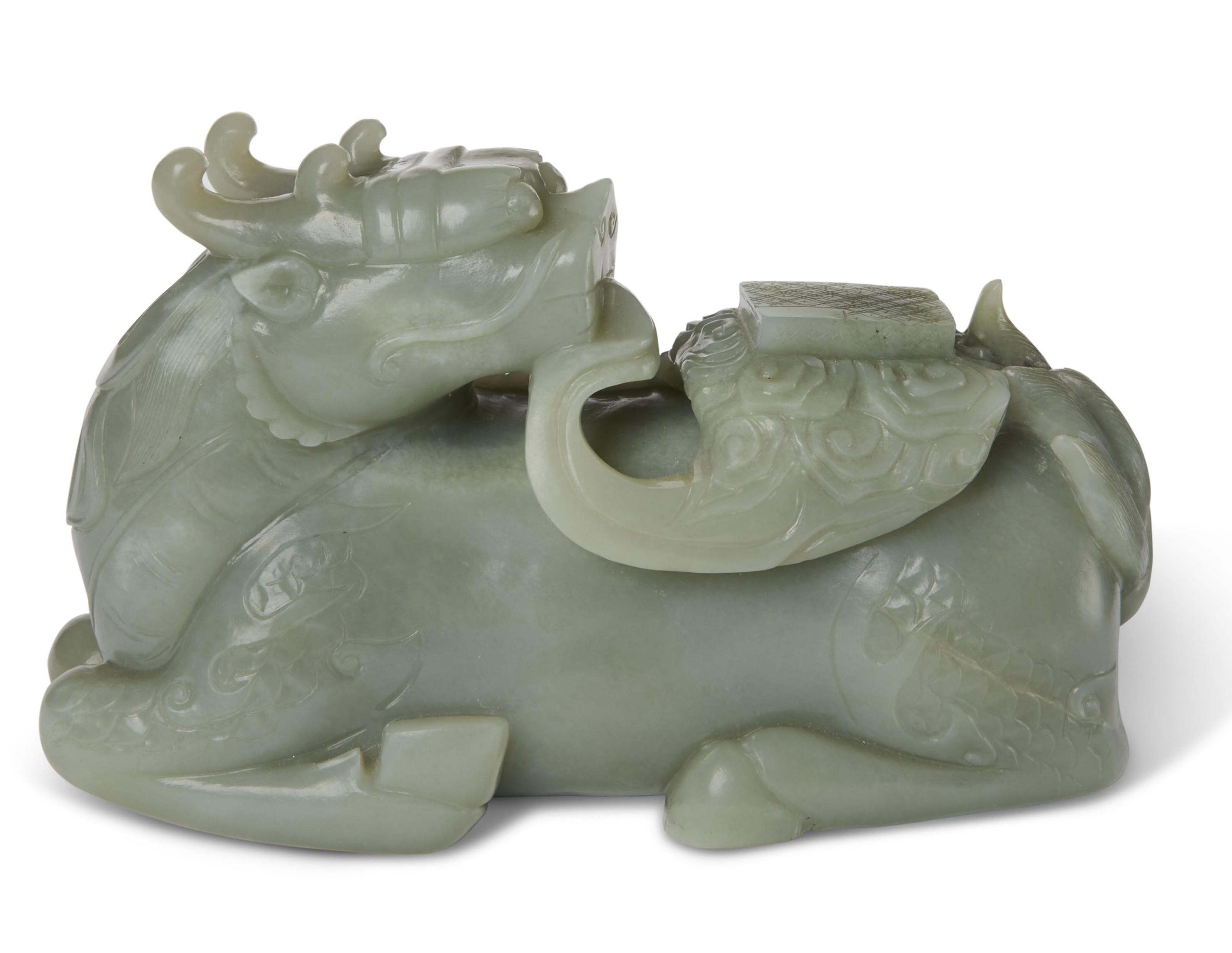 A LARGE GREYISH-GREEN JADE CARVING OF A MYTHICAL BEAST, | Christie’s